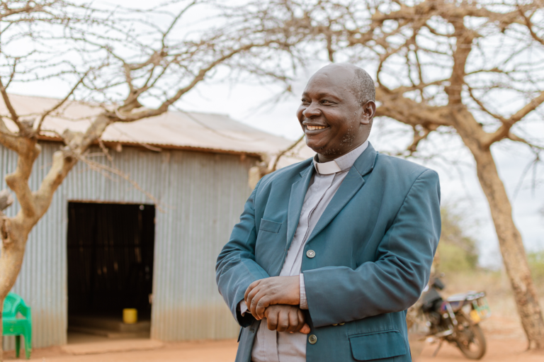 Reverend Christopher Ndambuki looks out from his pulpit to his hungry ...